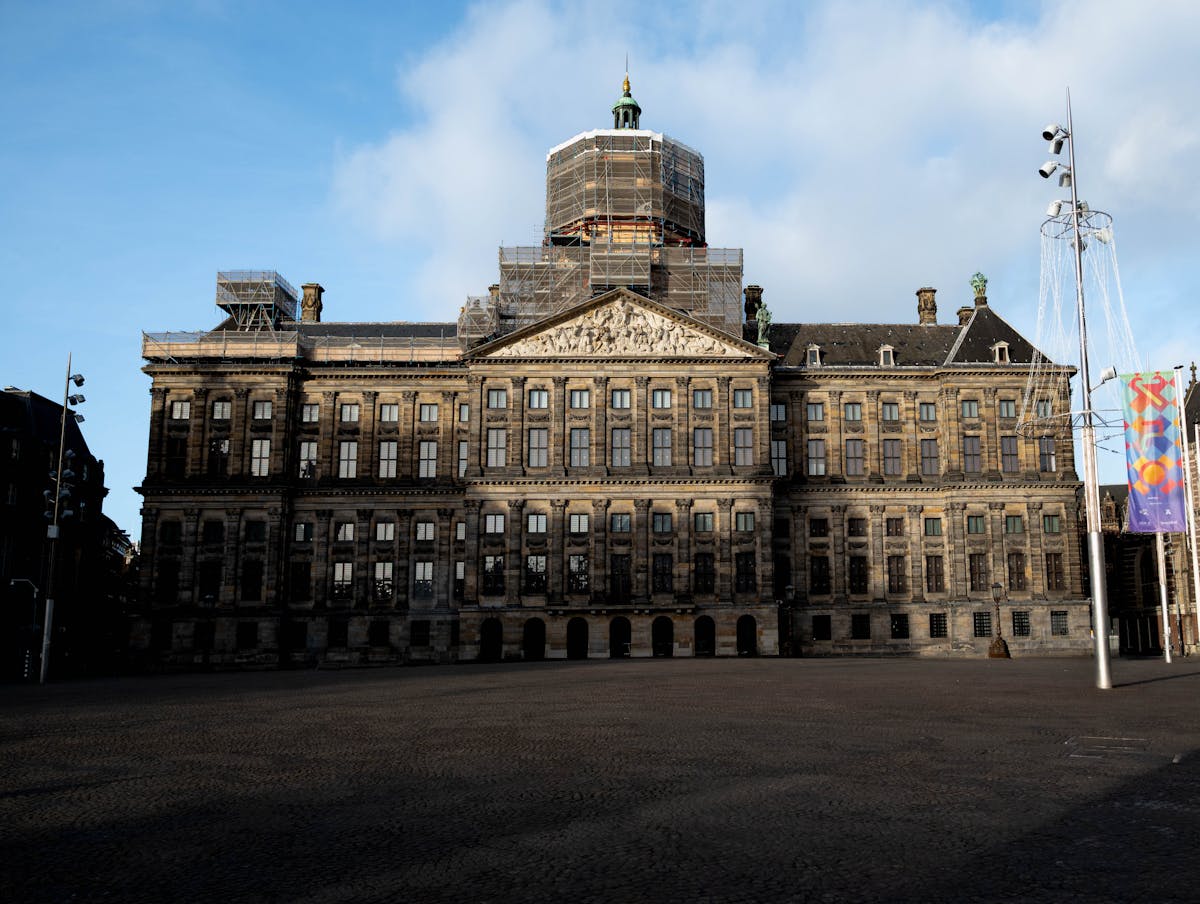 The Royal Palace on Dam Square in Amsterdam, a grand classical building that dominates the city center