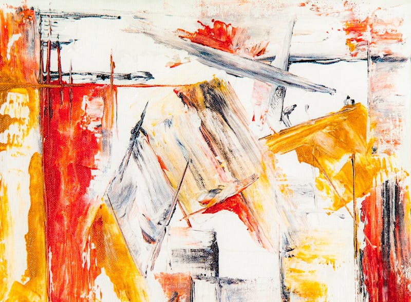 Dynamic abstract expressionism art in red, yellow, and white tones on canvas