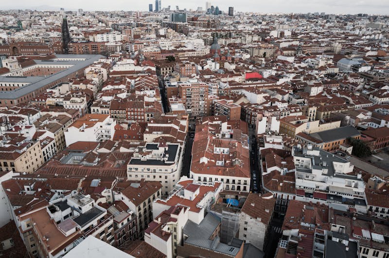 Aerial view of Madrid red-tiled rooftops and dense urban landscape