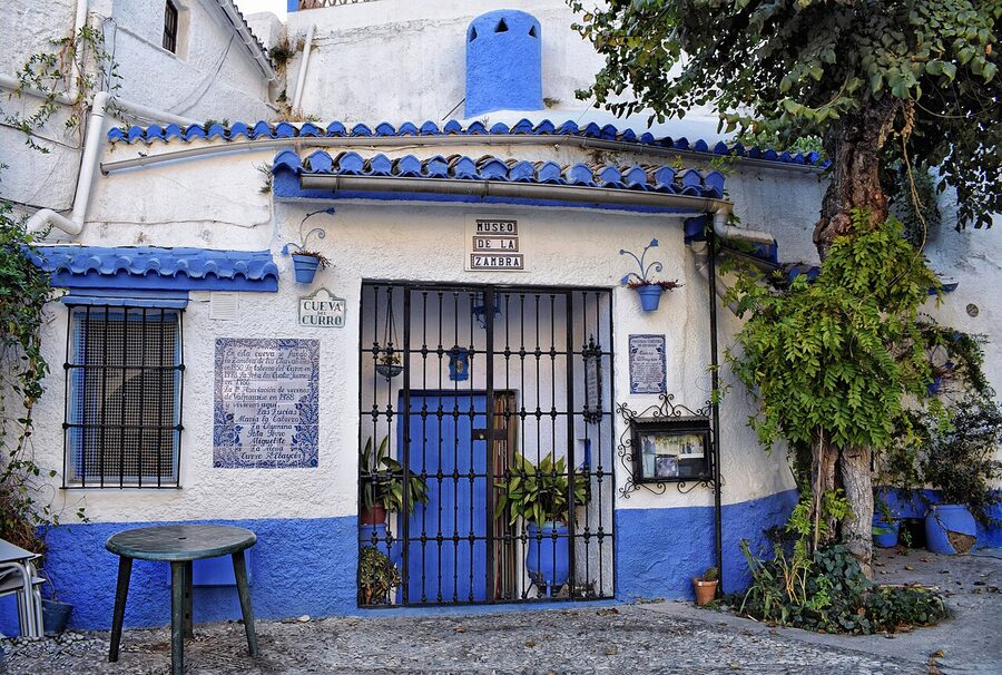 Cave homes carved into the hillside in the Sacromonte district of Granada Spain