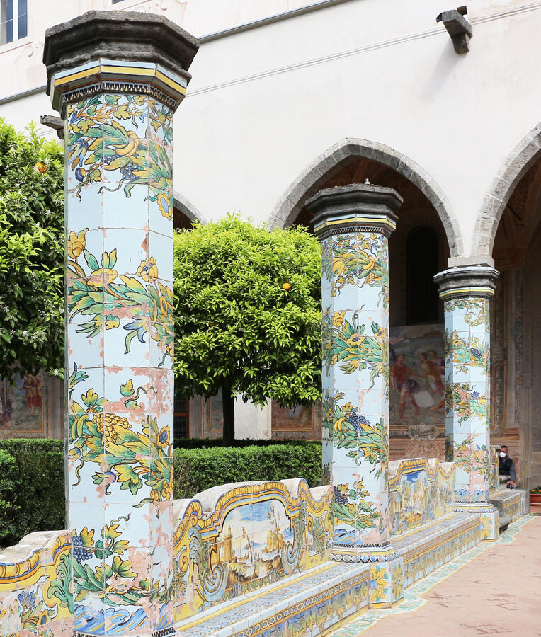 Garden walkway and decorative tile work in the cloister of Santa Chiara basilica Naples