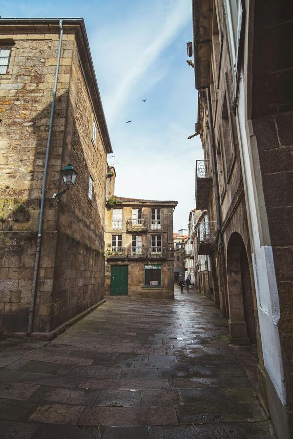 Empty medieval street in Santiago de Compostela at dusk