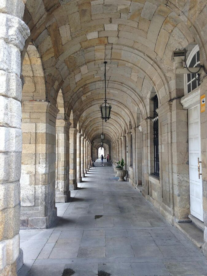 Beautiful stone arcade with columns in Santiago de Compostela old town