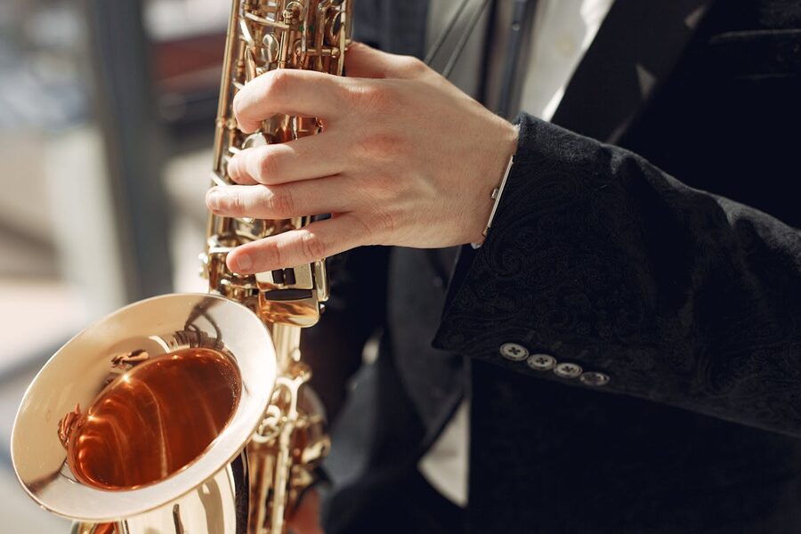 Elegant close-up of a musician playing saxophone at a live jazz performance