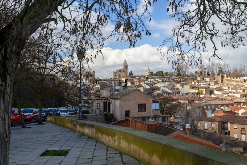 Scenic panoramic view of Toledo Spain showing historic rooftops churches and towers