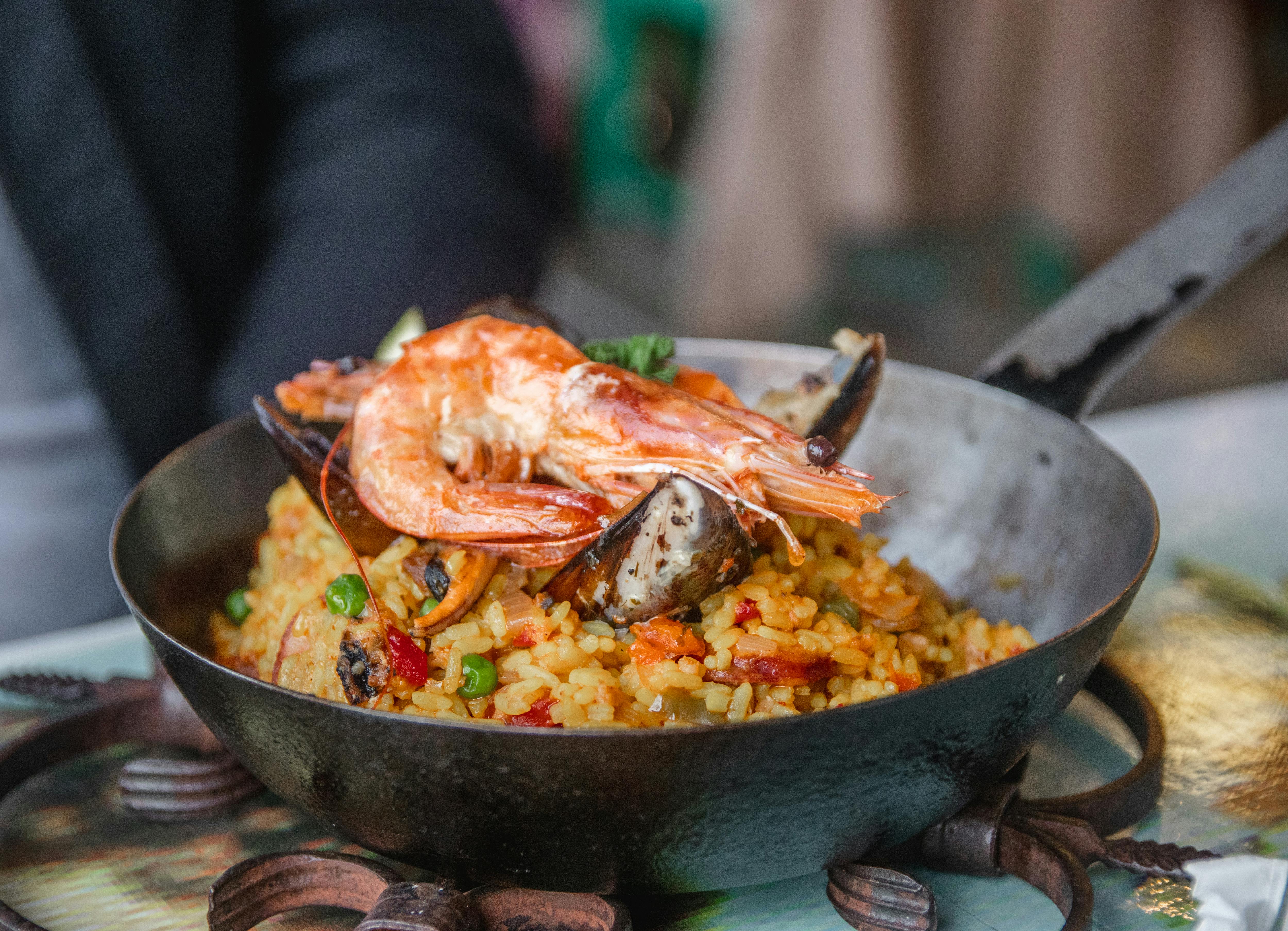 Seafood paella with shrimp and mussels perfectly cooked