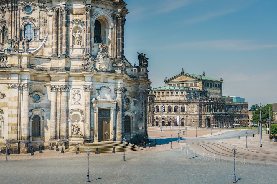 The Semperoper and Hofkirche rising above Dresden under clear blue skies