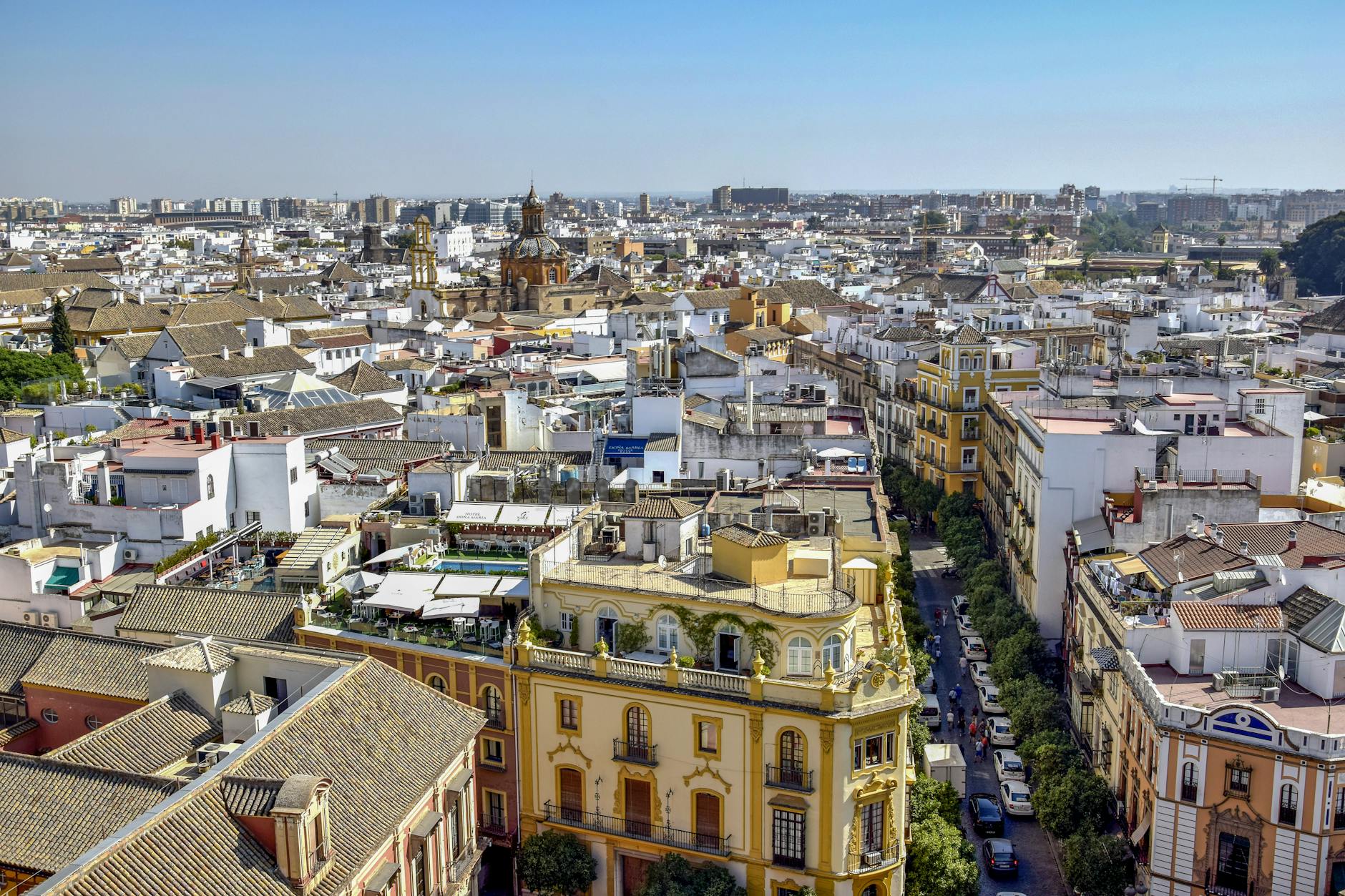 Seville cityscape seen from above showing the dense historic center and landmarks
