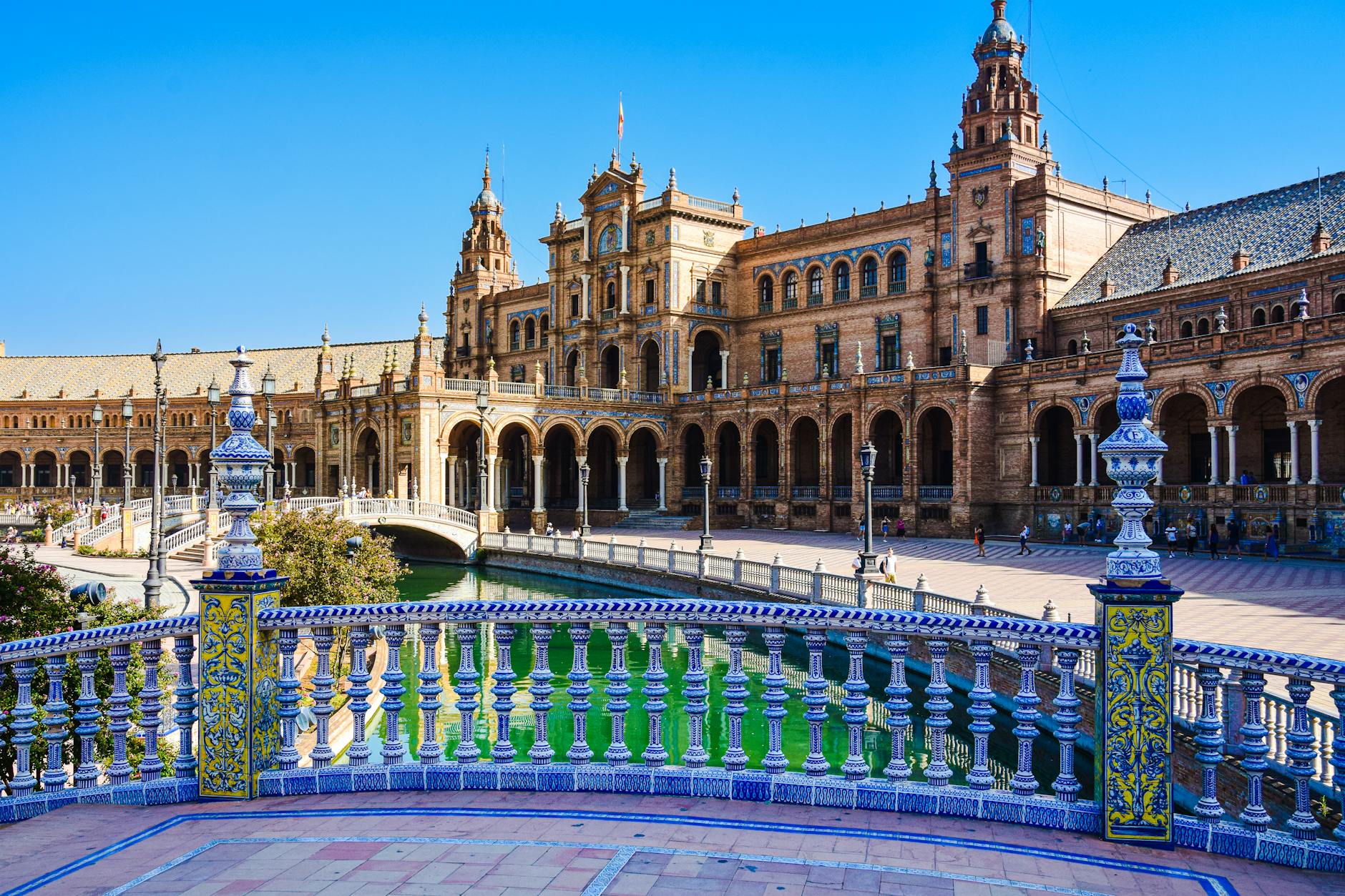 Intricate architectural details of Plaza de Espana showing the bridge and ceramic work