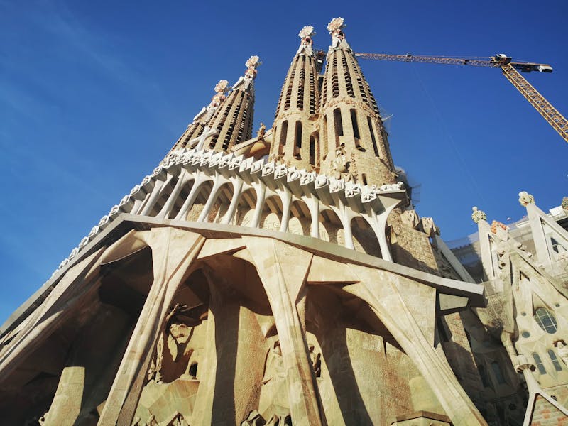 The stark angular sculptures of the Passion facade at Sagrada Familia depicting the crucifixion