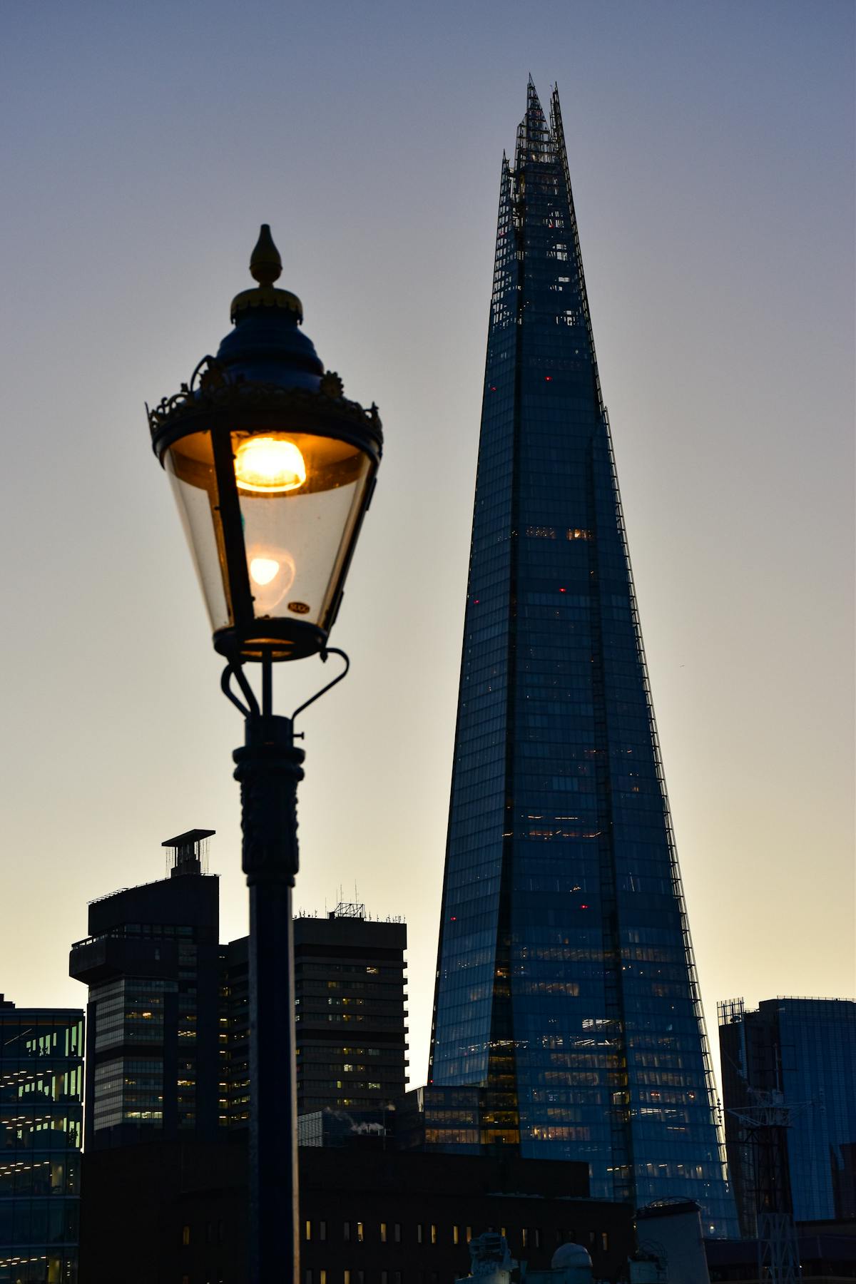 Glass panels of The Shard reflecting the sky