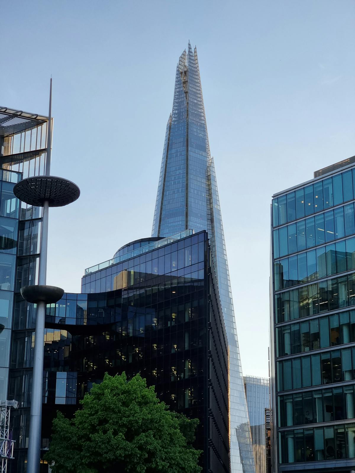 The Shard lit up at night against the London skyline
