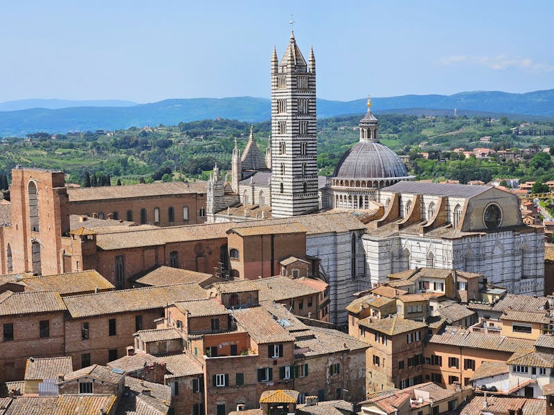 Aerial view of Siena Cathedral and surrounding medieval buildings in Tuscany
