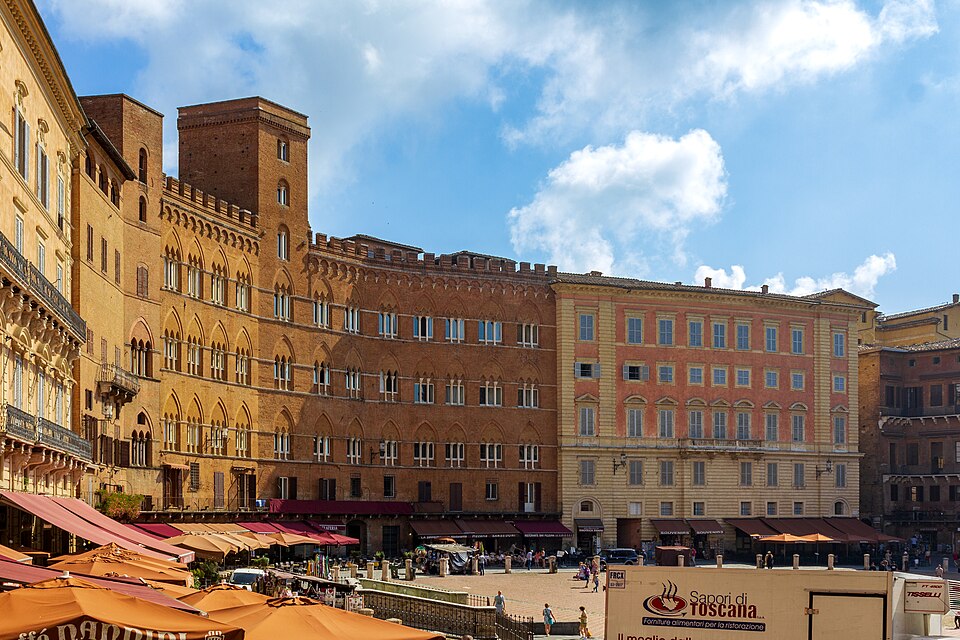 The shell-shaped Piazza del Campo in Siena with the Palazzo Pubblico and Torre del Mangia