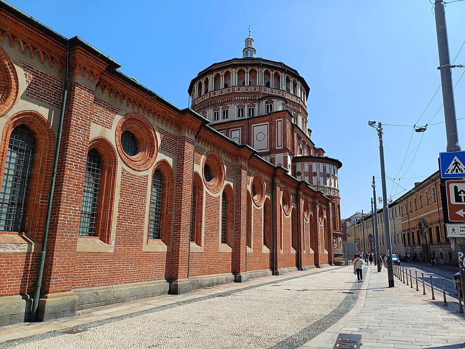 The brick and stone facade of Santa Maria delle Grazie church in Milan, Italy