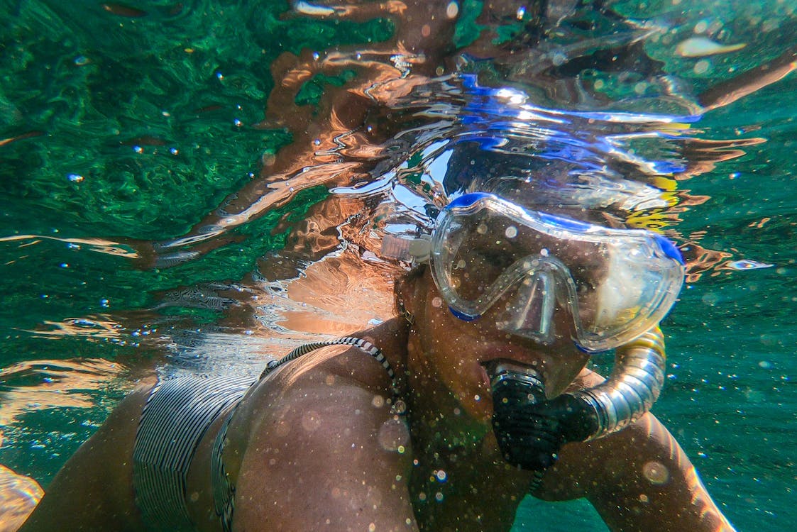 Snorkeling in crystal-clear waters of the Spanish coast