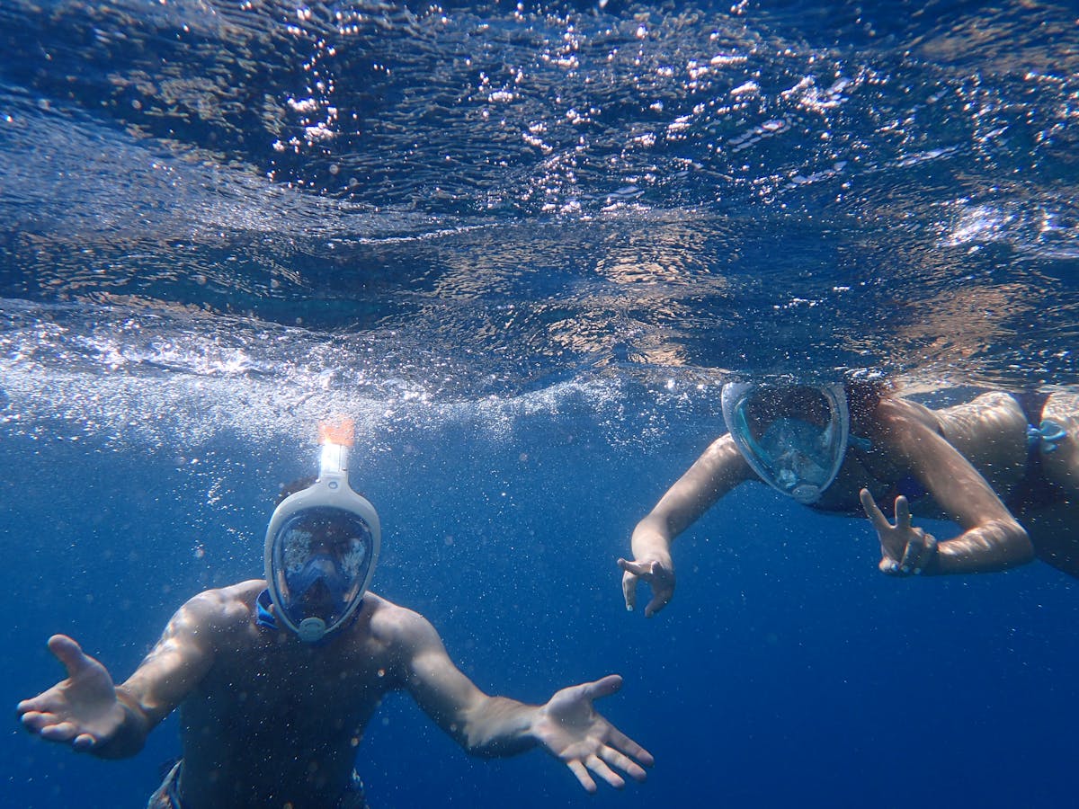 Snorkeler exploring clear Mediterranean waters