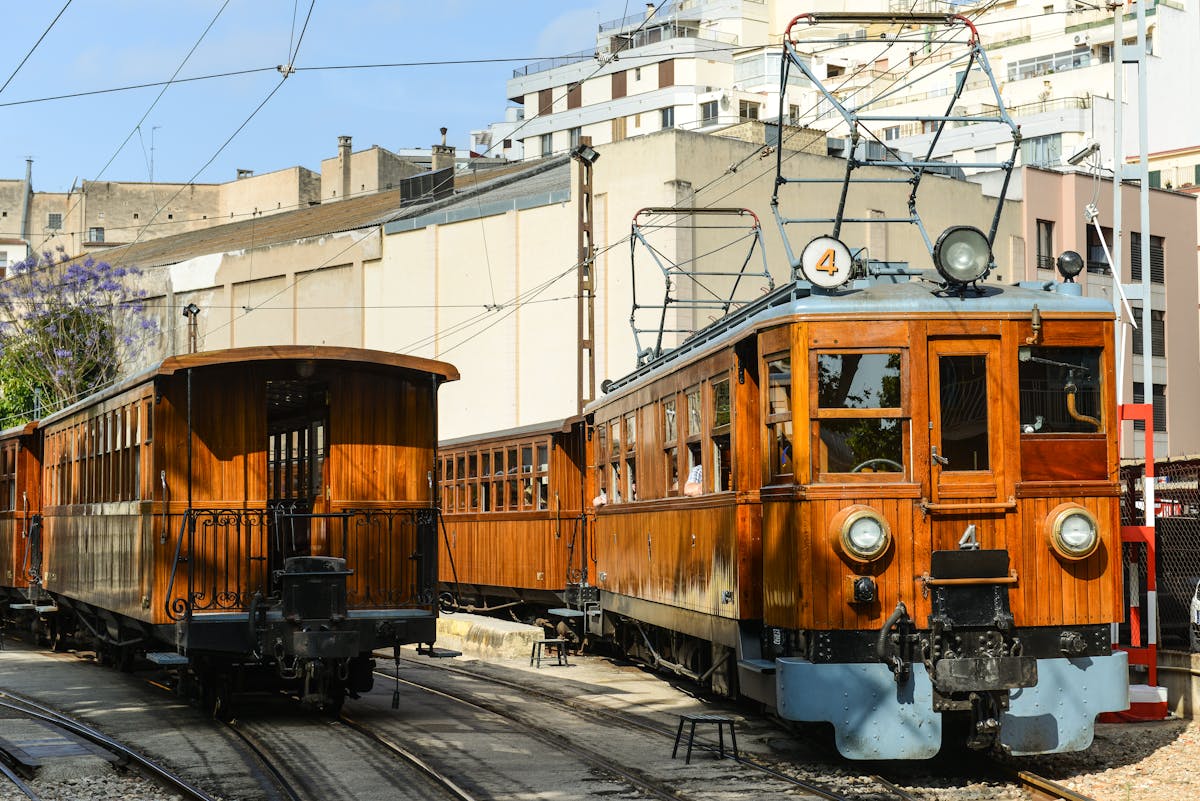 Wooden vintage tram running through Palma Mallorca street