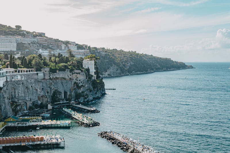 Stunning aerial view of Sorrentos coastline featuring cliffs and the Tyrrhenian Sea
