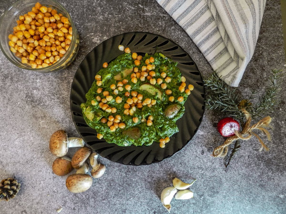 Plate of espinacas con garbanzos spinach and chickpeas with mushrooms