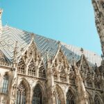 Gothic architecture details of St Stephens Cathedral in Vienna under blue sky