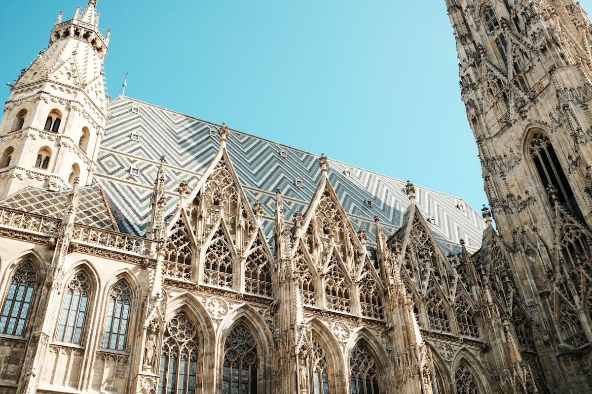 Gothic architecture details of St Stephens Cathedral in Vienna under blue sky