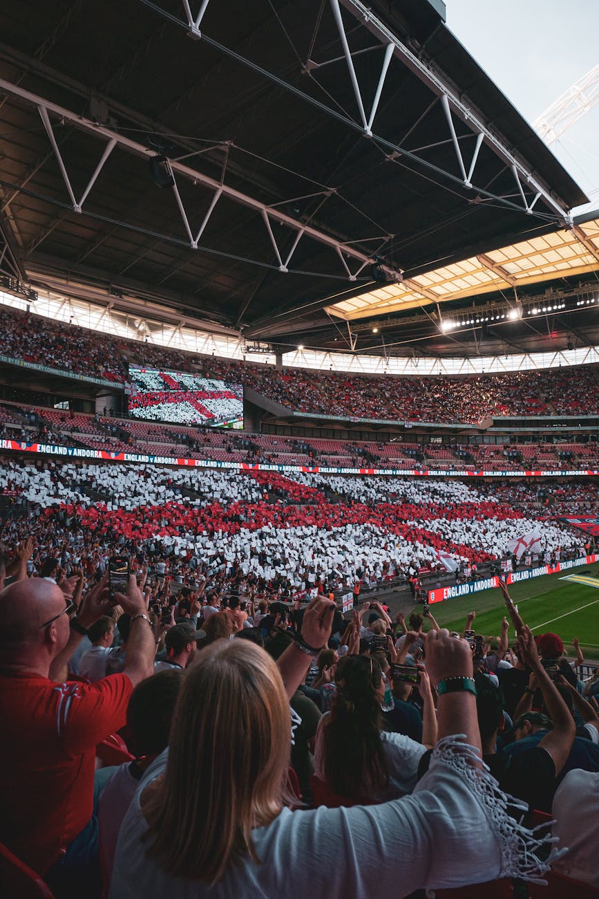 Crowds cheering under the iconic Wembley roof during England match