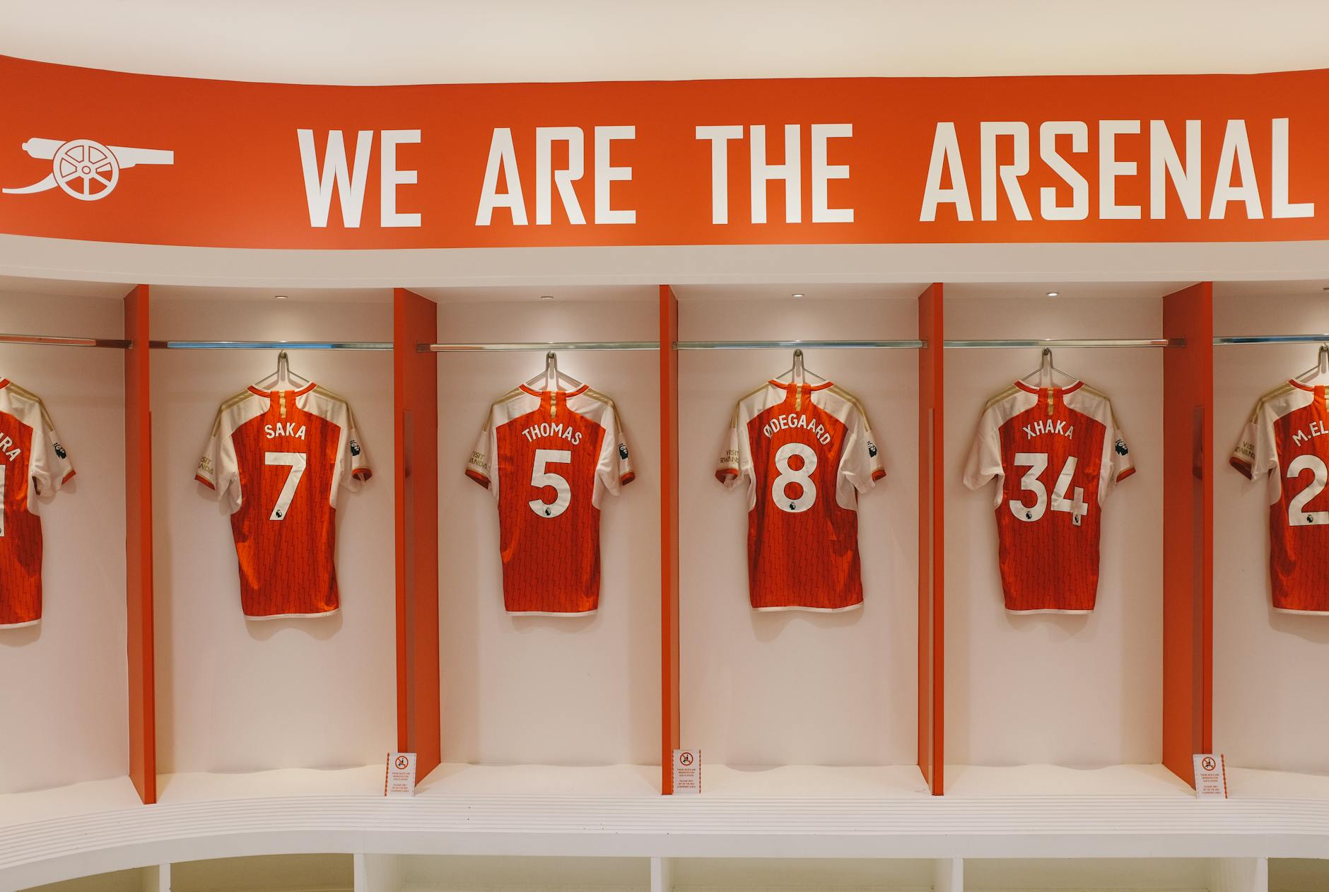 Arsenal FC jerseys on display in Emirates Stadium locker room