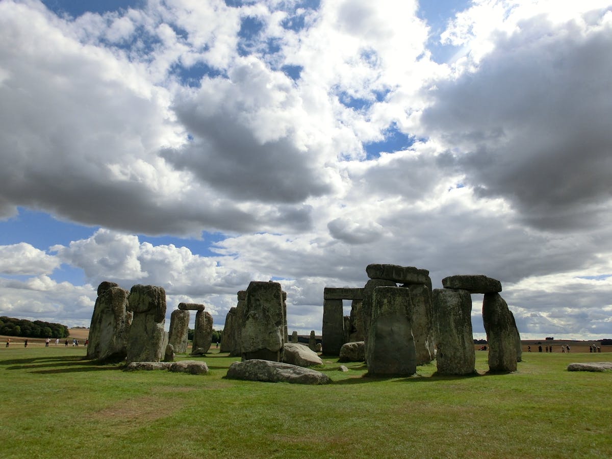 Classic front view of Stonehenge monument with cloudy sky
