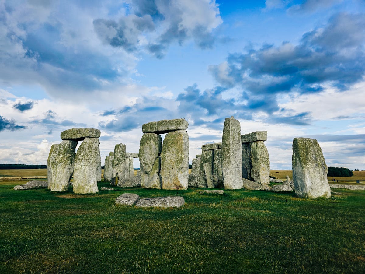 Ancient Stonehenge megaliths against a dramatic sky in England