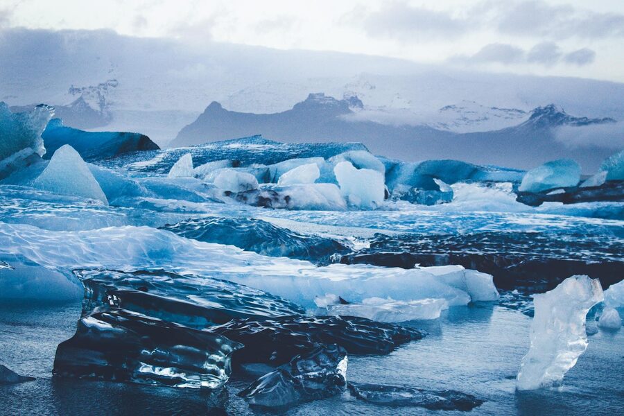 Stunning view of icebergs in Jökulsárlón Glacier Lagoon, Iceland's winter wonderland.