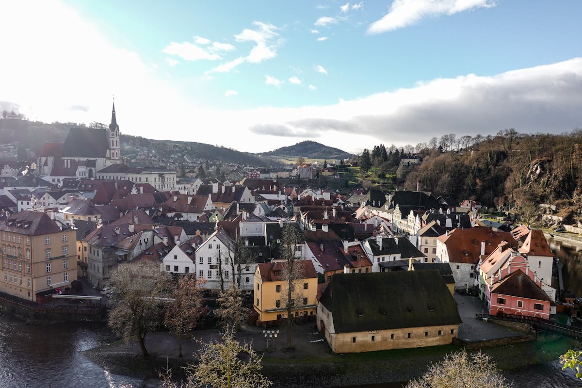 Stunning aerial view of Cesky Krumlov showing the full historic center surrounded by the Vltava River