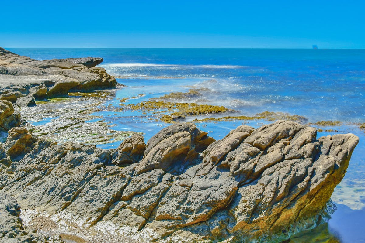 Rocky Mediterranean coastline with clear blue water near Alicante Spain