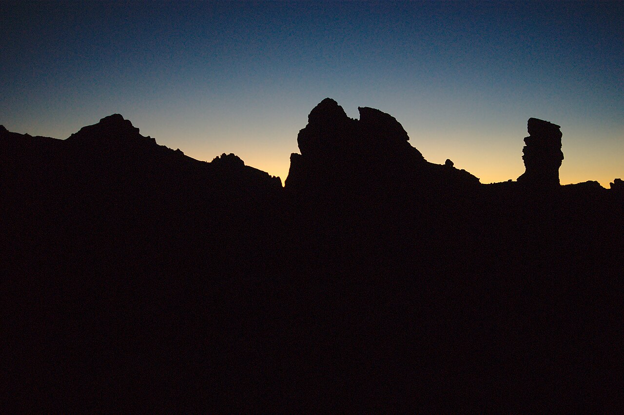 Mount Teide silhouetted against a colorful sunset sky