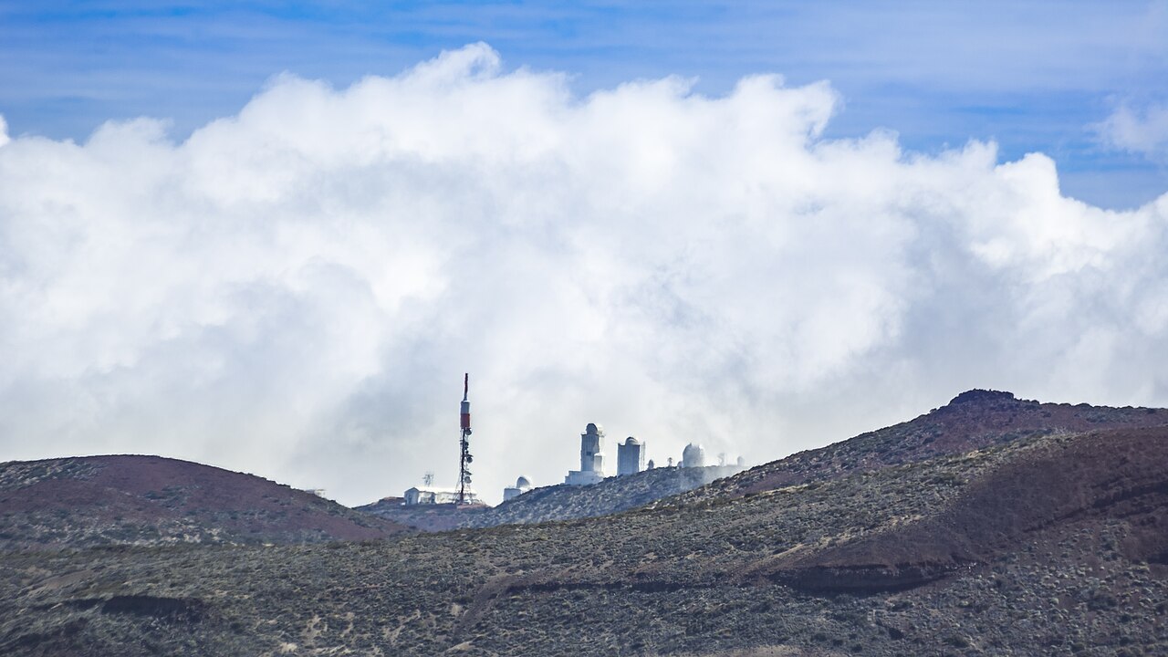 Teide Observatory telescopes with mountain backdrop