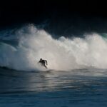 Surfer riding powerful waves in Tenerife