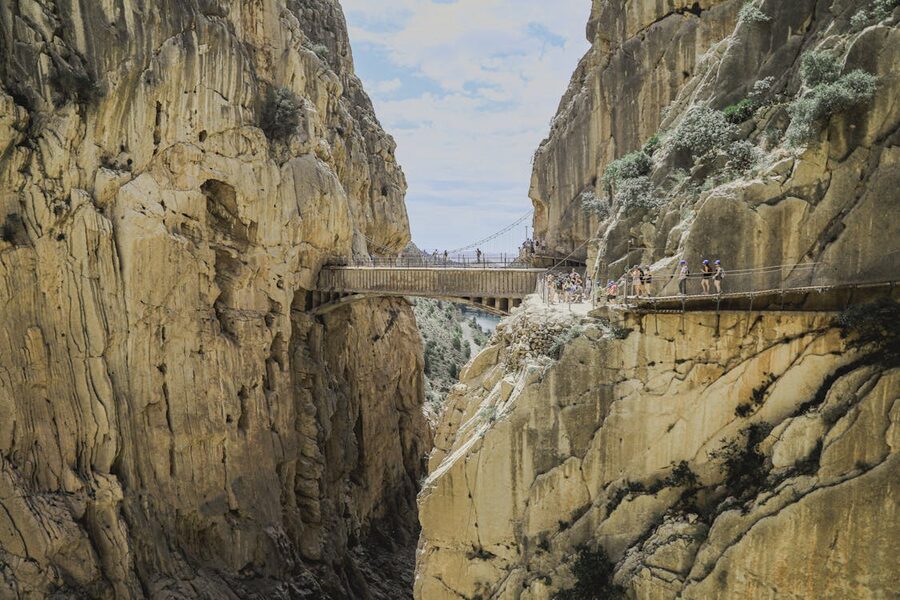 The Caminito del Rey footbridge nestled between rugged cliffs in Spain mountains