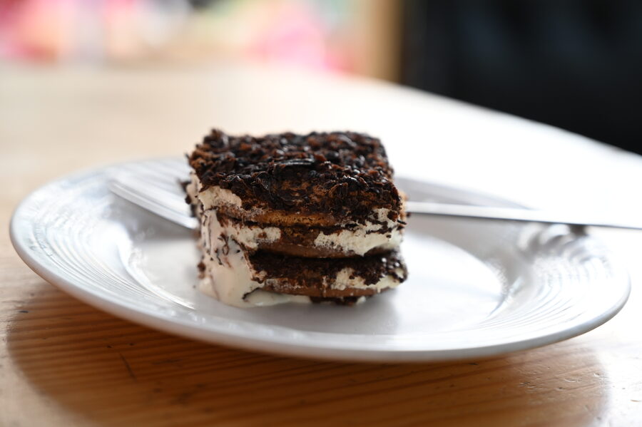 Tiramisu dessert showing layers of mascarpone cream and coffee-soaked ladyfingers
