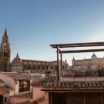 Toledo Cathedral tower and spires rising above the historic city skyline in Spain