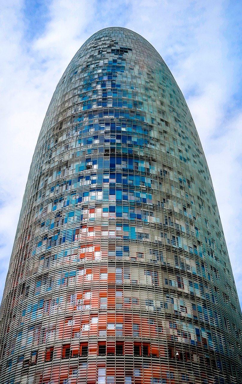 Detailed view of the Torre Glories facade showing its distinctive window pattern