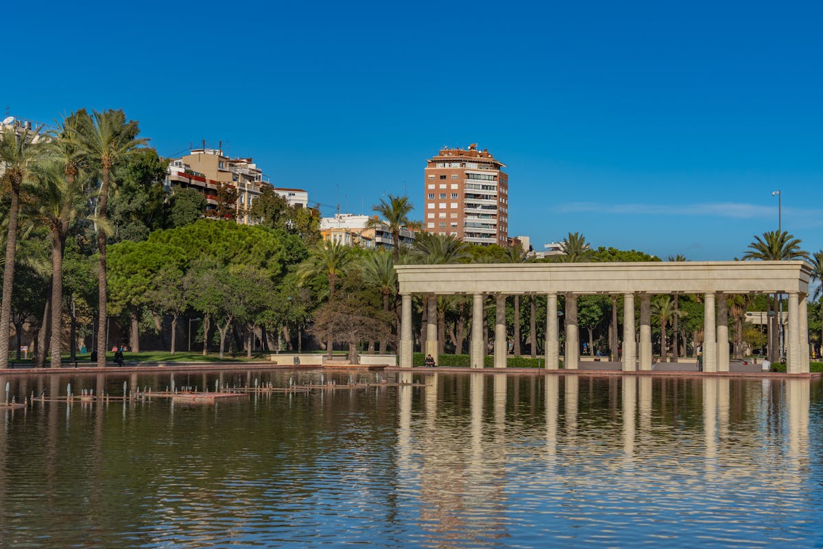 Turia Gardens park with surrounding architecture and trees in Valencia