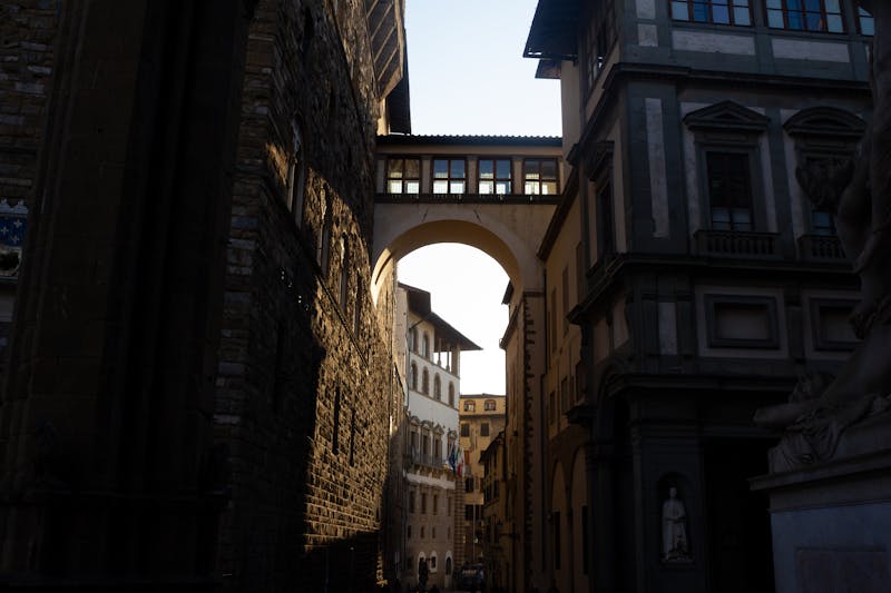 View through the arched corridor of the Uffizi Gallery in Florence