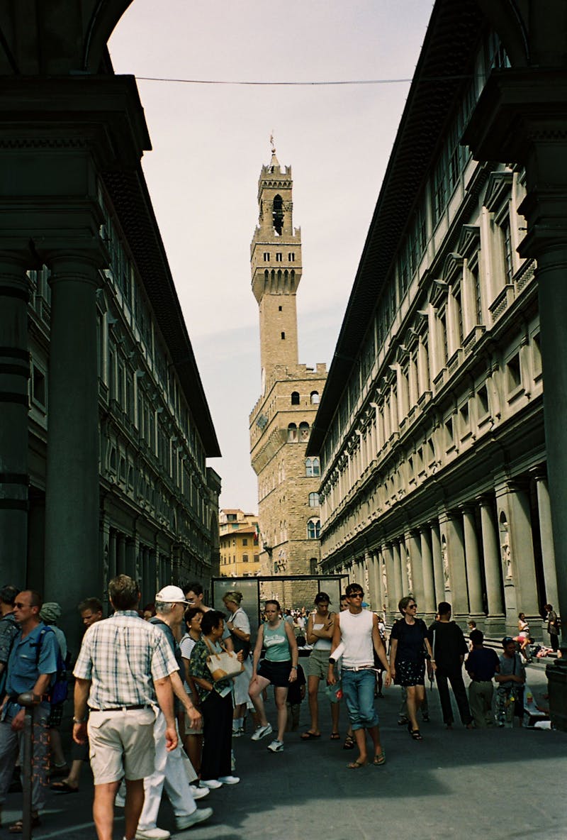 View of the Uffizi Gallery building with Palazzo Vecchio tower in Florence
