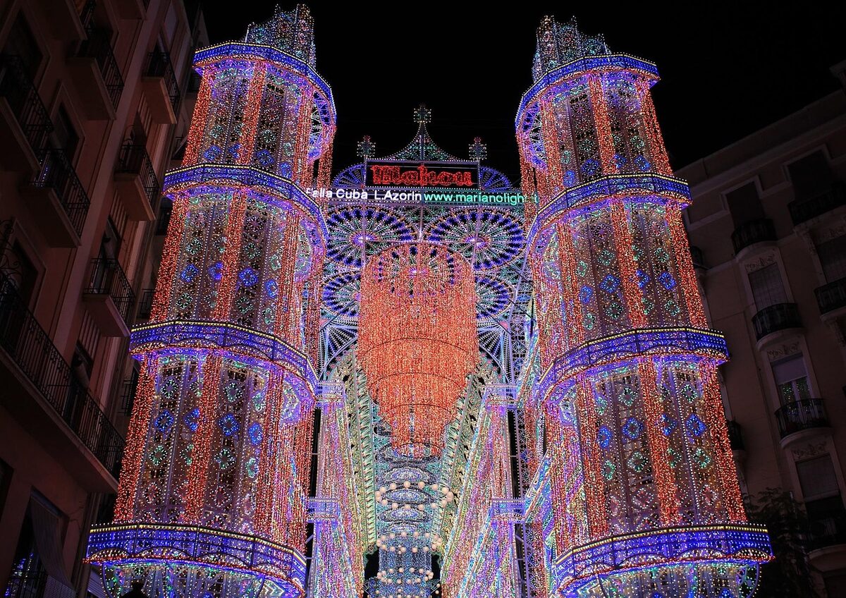 Illuminated streets of Valencia during Las Fallas festival at night