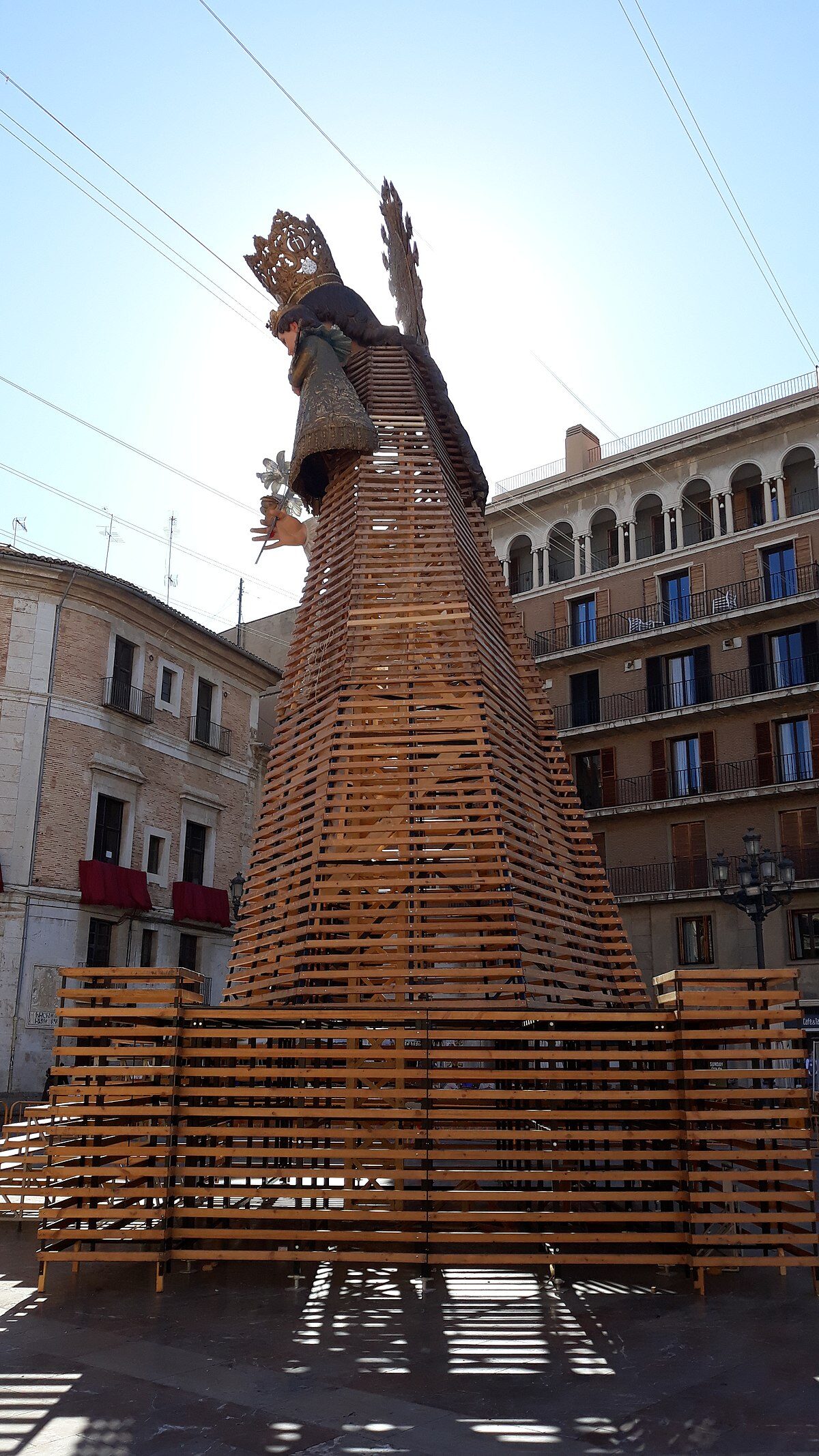 Flower offerings forming a cloak on the Virgin Mary statue during La Ofrenda