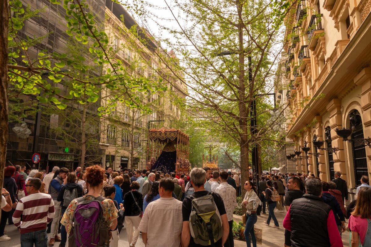 Packed crowd celebrating at a Spanish festival