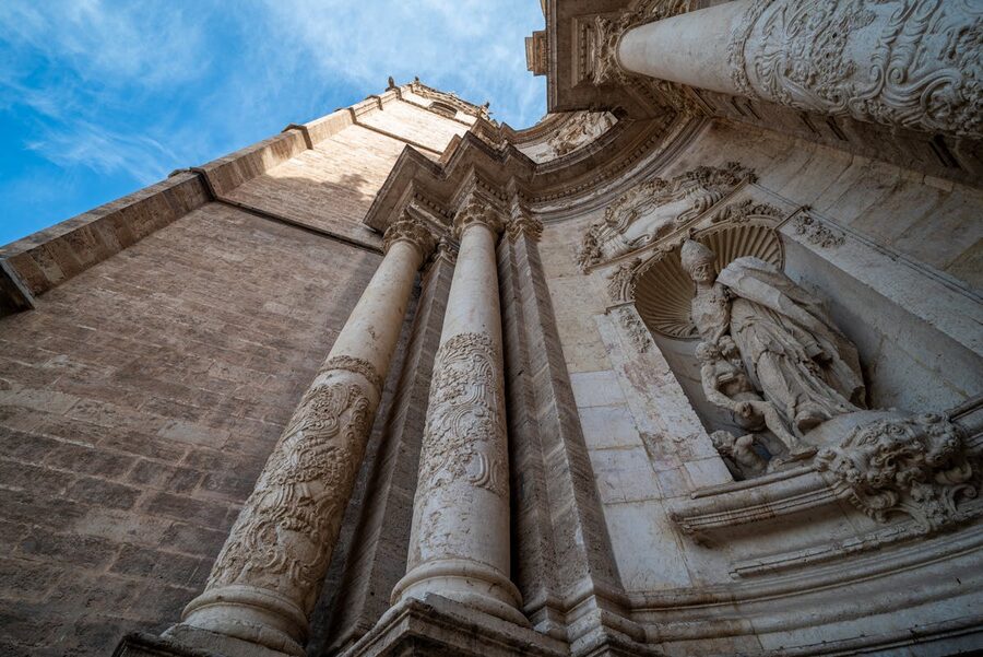 Detailed stone carvings and sculptures on the Puerta de los Apostoles of Valencia Cathedral