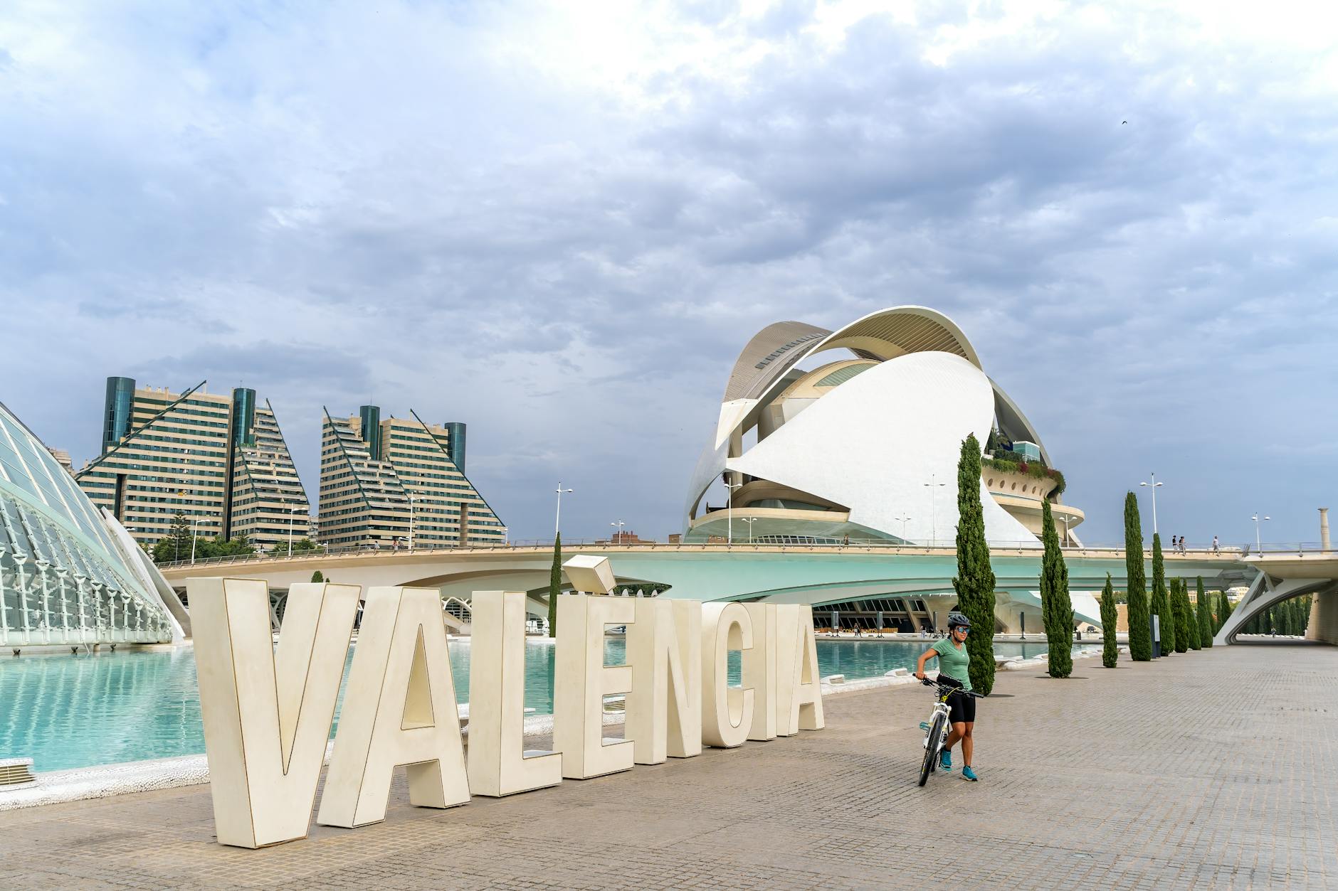 Modern architecture and cyclist at City of Arts and Sciences, Valencia