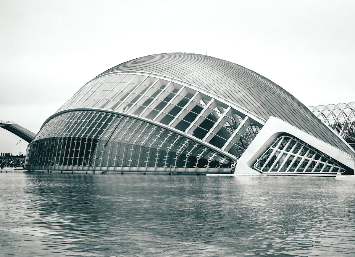 The Hemisferic building in Valencia in grayscale showing its architectural lines