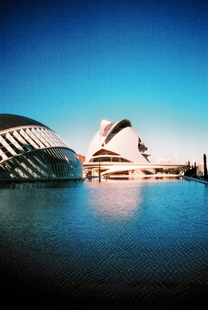 Hemispheric building reflected in water at City of Arts and Sciences, Valencia